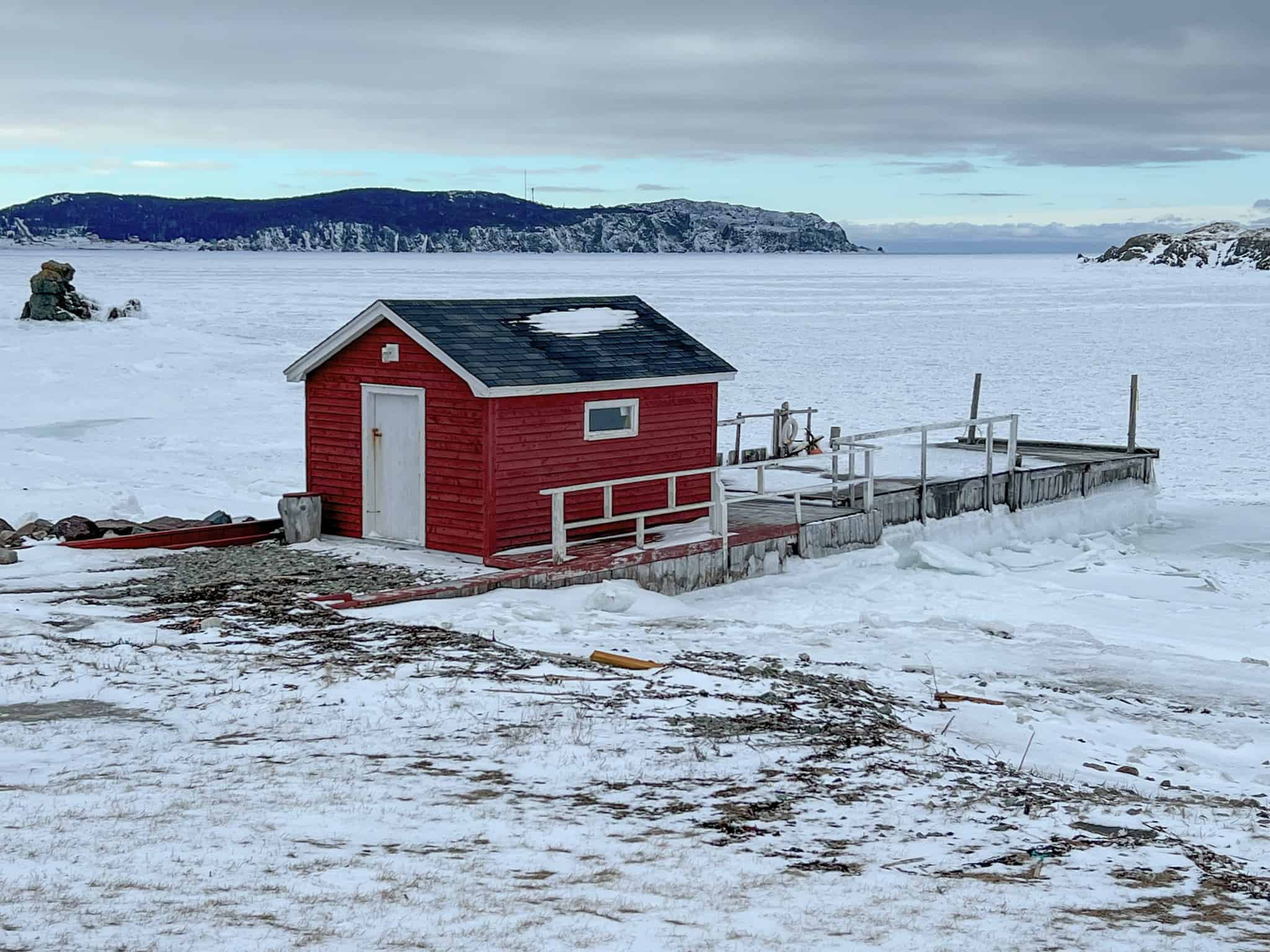 Cora Lee Rennie - Red Fishing Stage in Sea Ice, Jenkins Cove ...